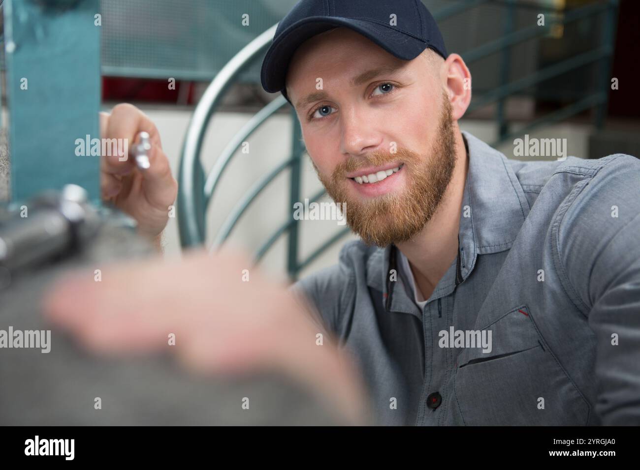Hands young man inspector hi-res stock photography and images - Alamy