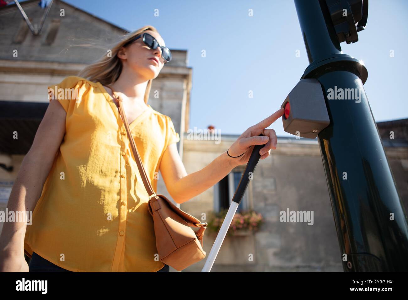 blind woman at traffic lights on pedestrian crossing Stock Photo - Alamy
