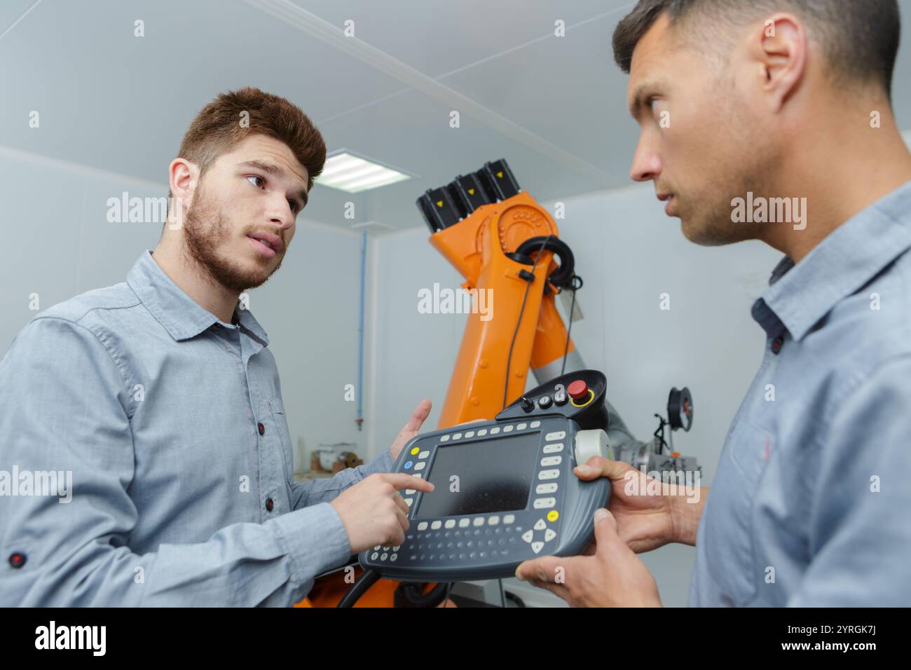 portrait of men and robotic machine Stock Photo - Alamy