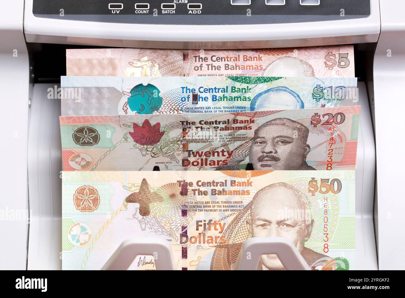 Bahamian money - dollar in the counting machine Stock Photo - Alamy