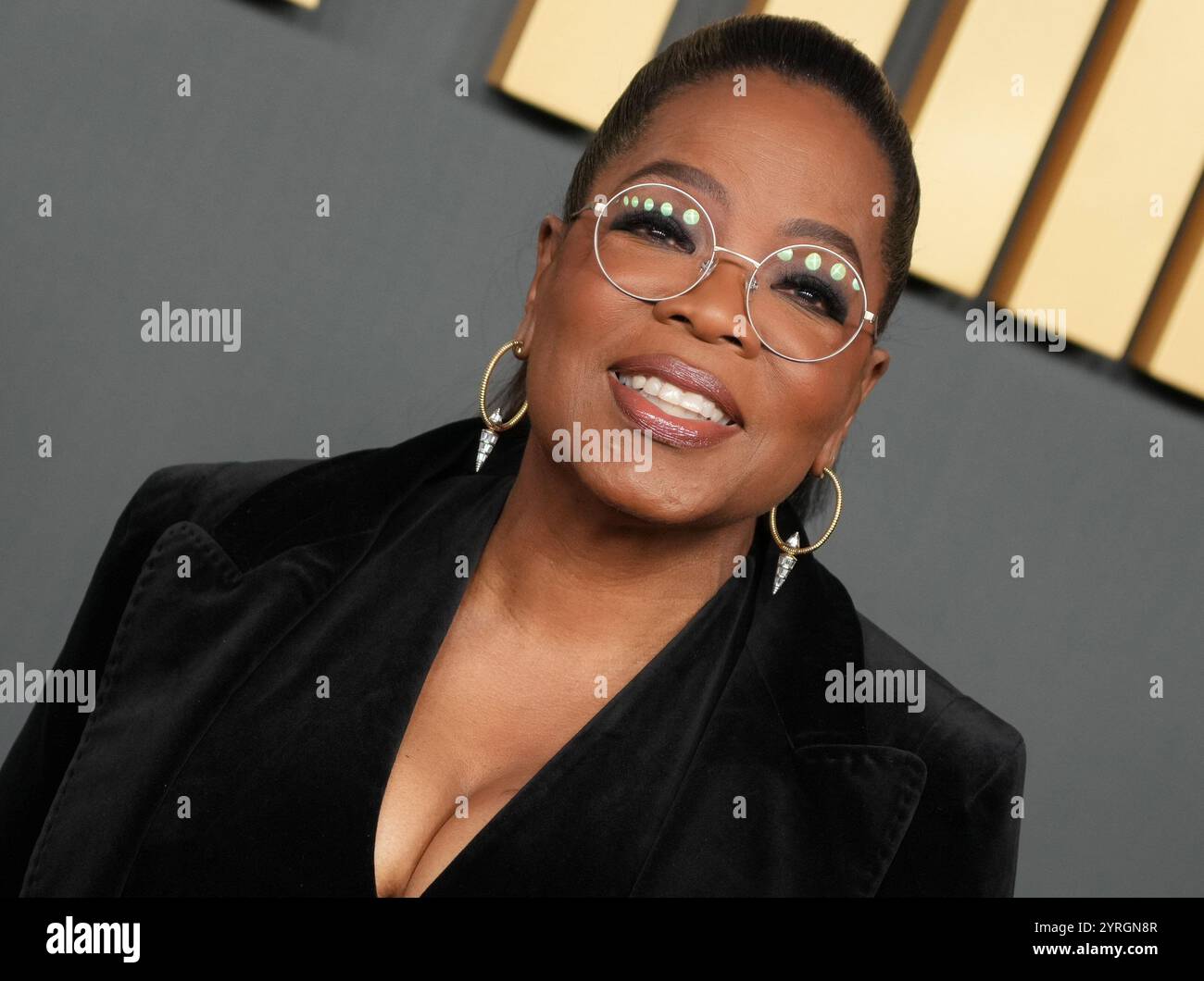 Oprah Winfrey arrives at Netflix's THE SIX TRIPLE EIGHT Premiere held ...