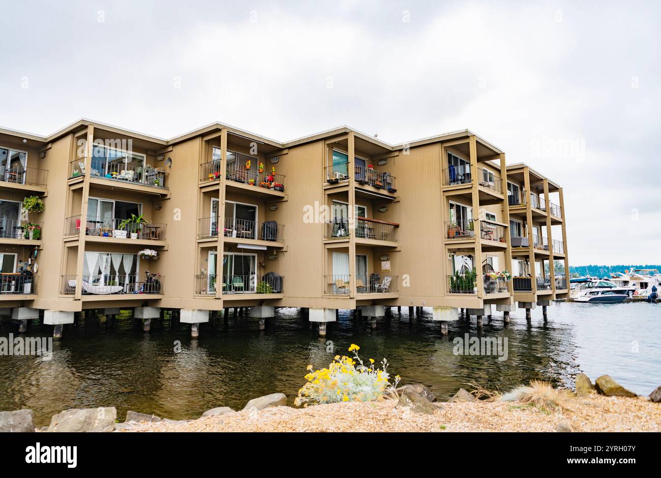 Building with residential apartment at the river. Harbor residential ...