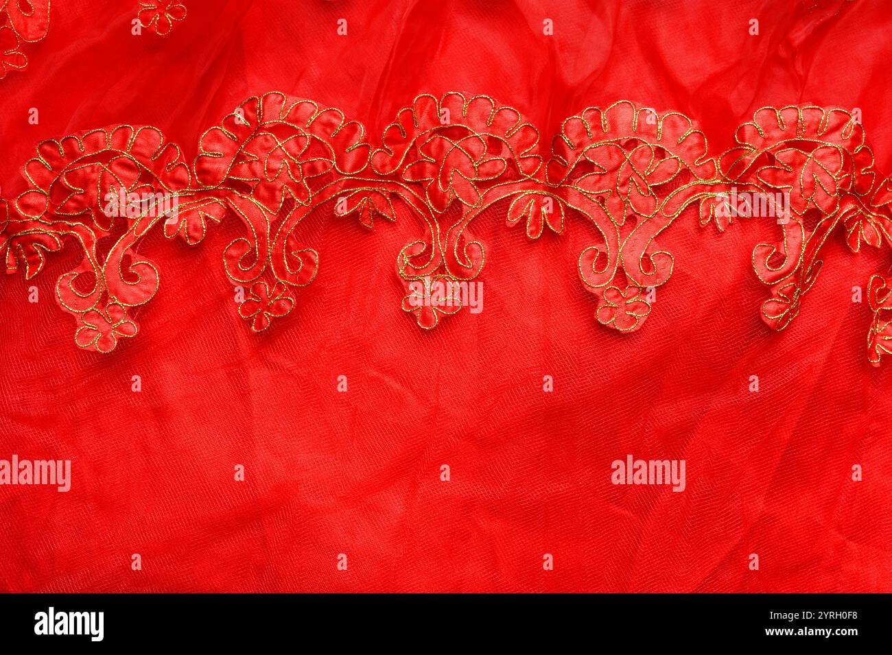 Red textile embroidery wedding background Stock Photo - Alamy