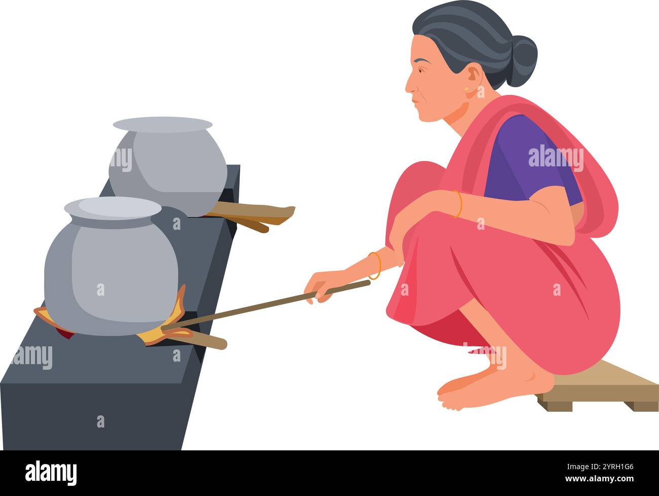 Indian village woman cooking food with traditional way of baking ...