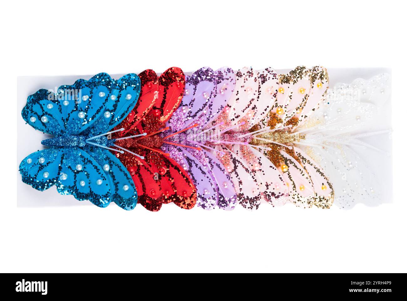Fake shiny butterflies set on white background, for hobbies and decor ...