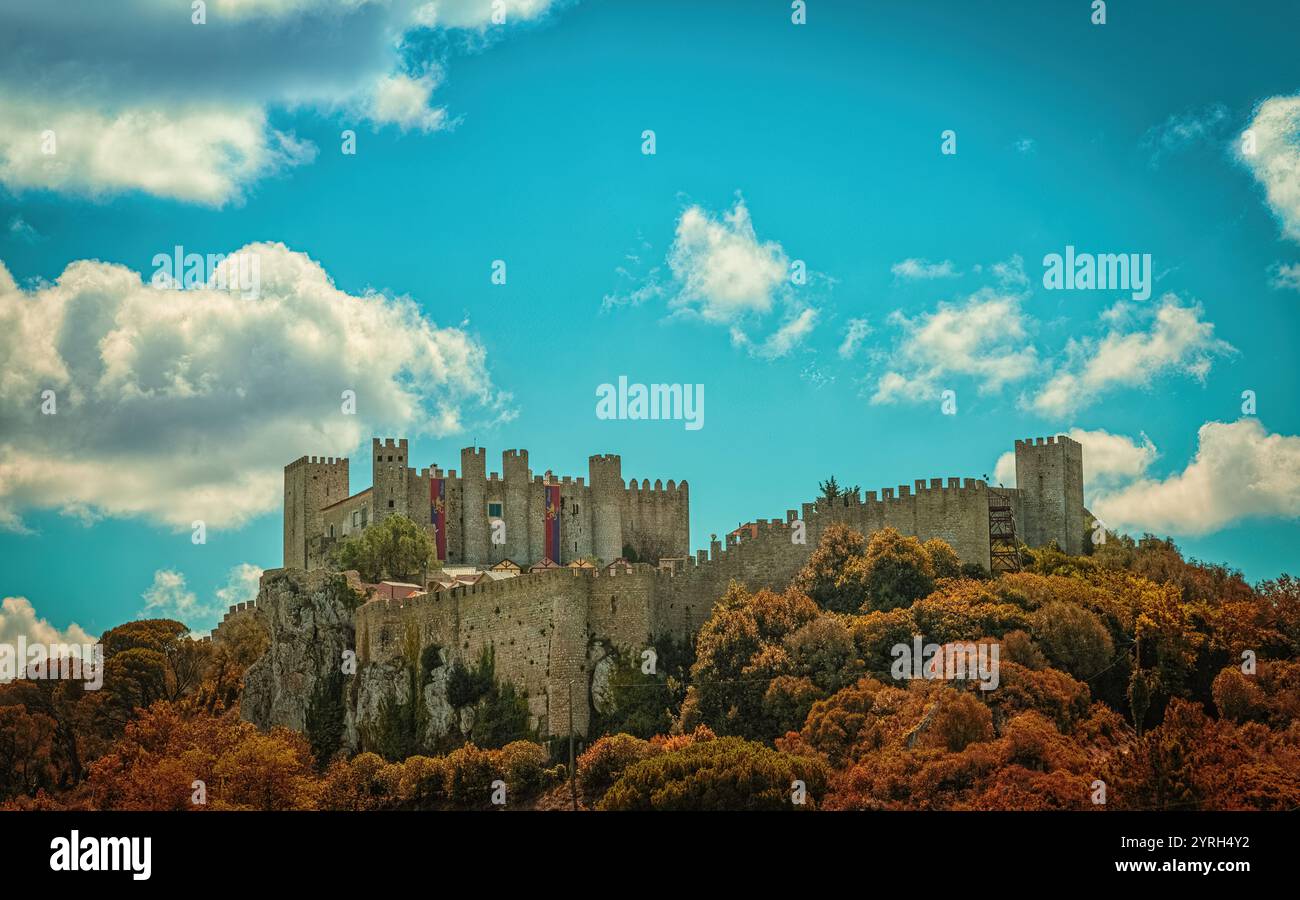 The medieval obidos castle sits proudly on a hill. Its ancient stone ...