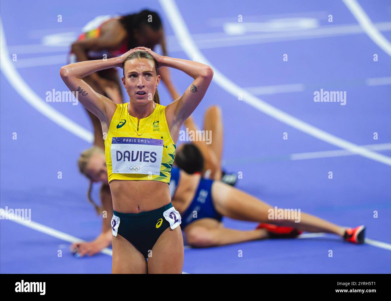 Rose Davies participating in the 5000 meters at the Paris 2024 Olympic ...
