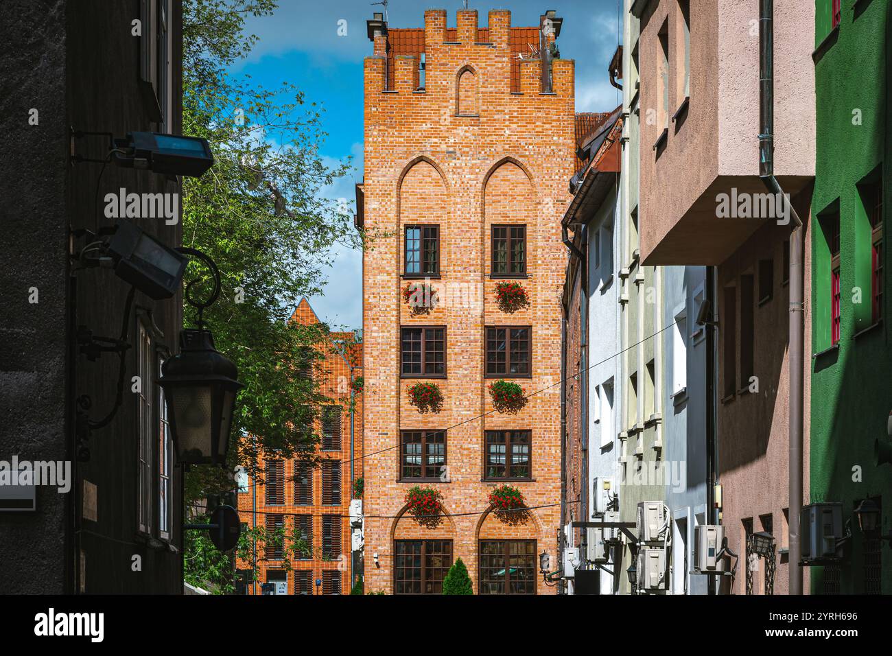 Sunlight bathes the historic brick buildings of gdansk, poland ...