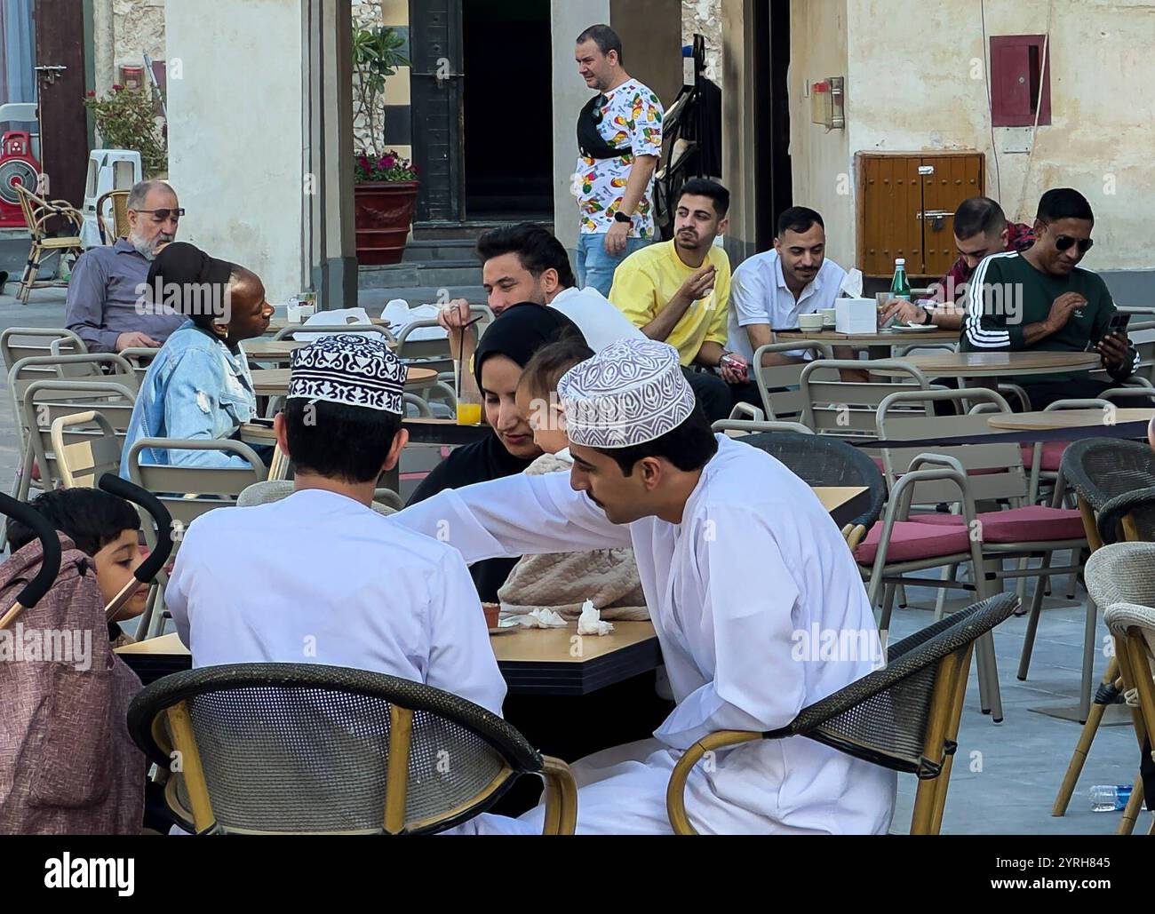 WINTER WEATHER IN DOHA, People sit outside a cafe in Downtown in the ...