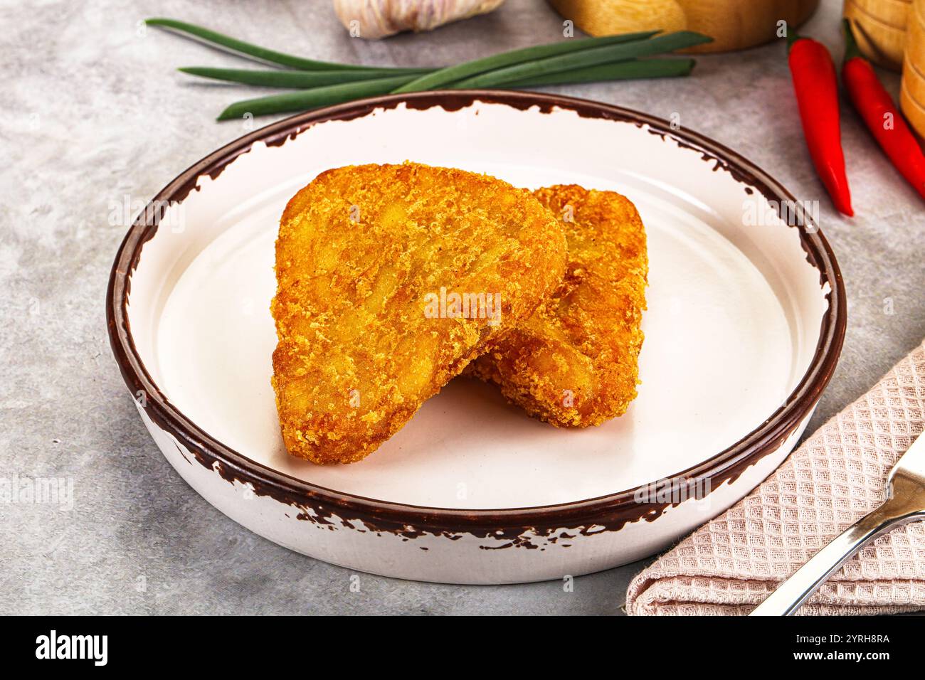 Fried potato hash brown snack for breakfast Stock Photo - Alamy