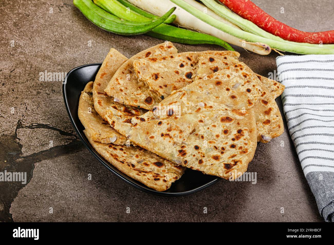 Indian vegetarian Aloo Paratha - bread with potato Stock Photo - Alamy