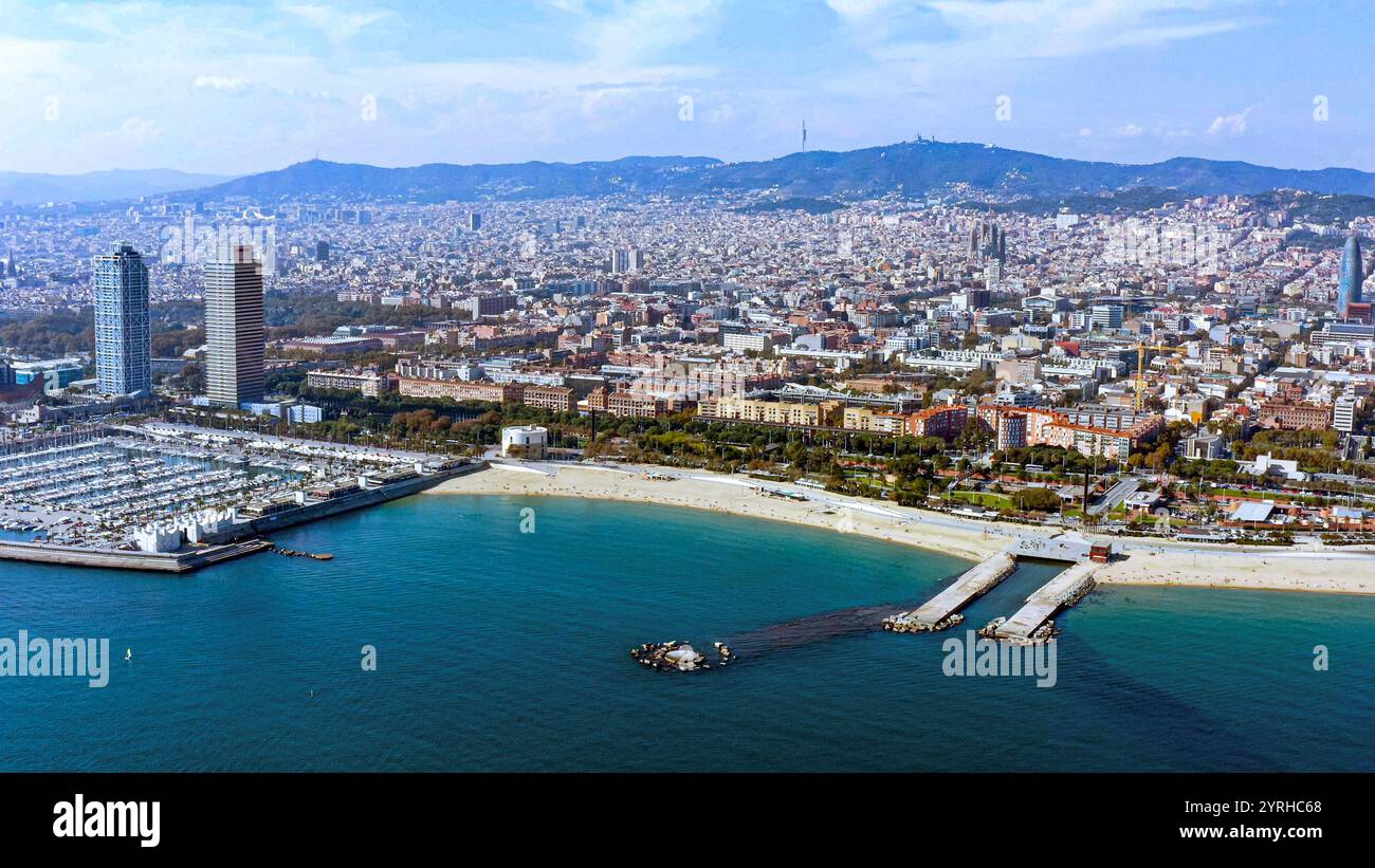 Stunning aerial view of Barcelona showcasing its vibrant coastline ...