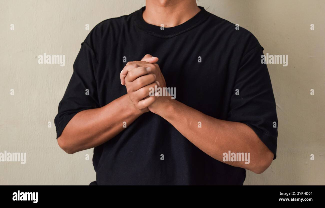 Young man saying believe in sign language, showing asl lesson ...