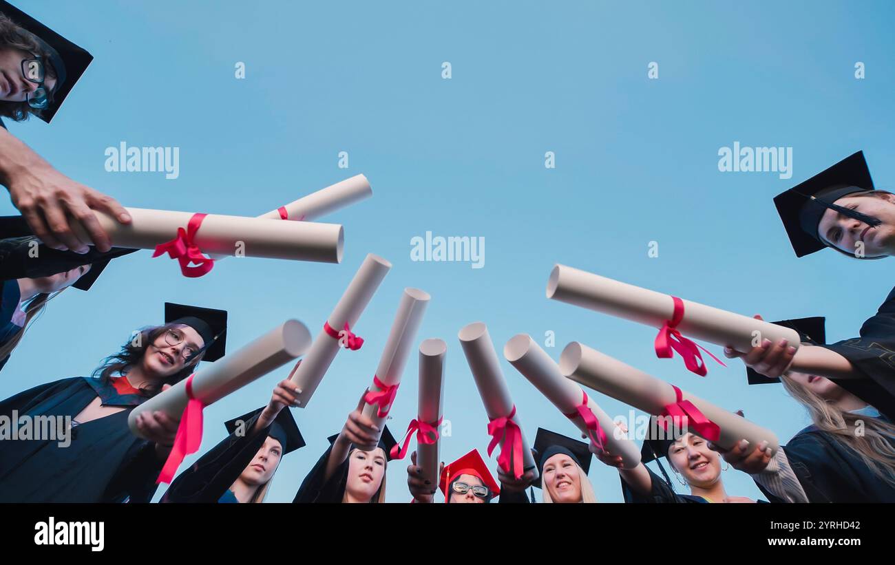 Celebration friends joyfully raise hi-res stock photography and images ...