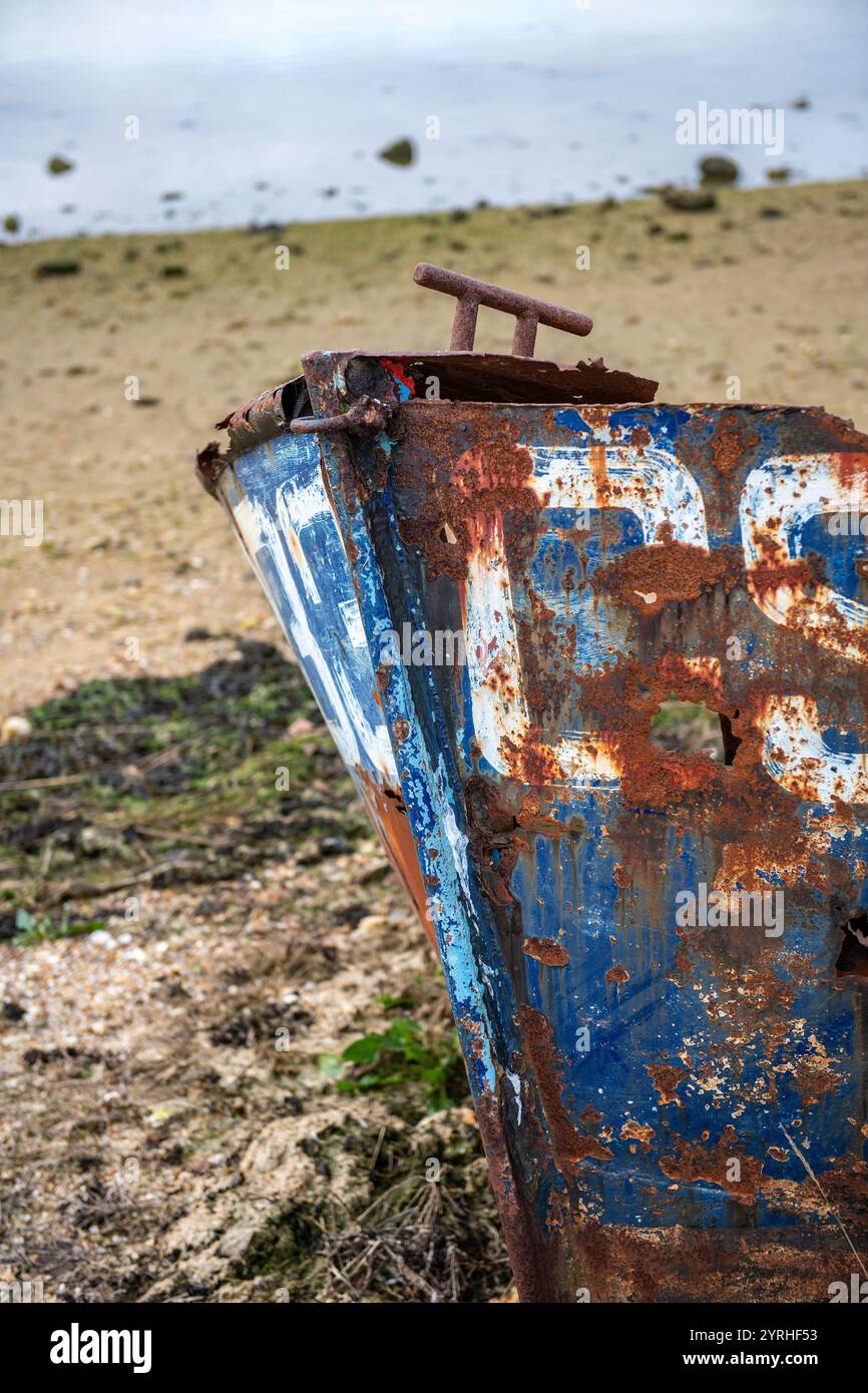 rusty old shipwreck or wreck of an old, abandoned fishing boat rotting ...
