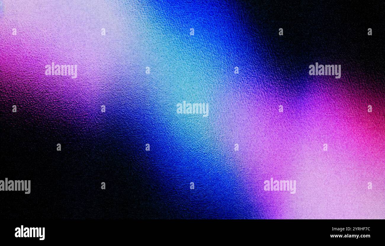 A captivating blend of colors emerges in a grainy texture, presenting ...