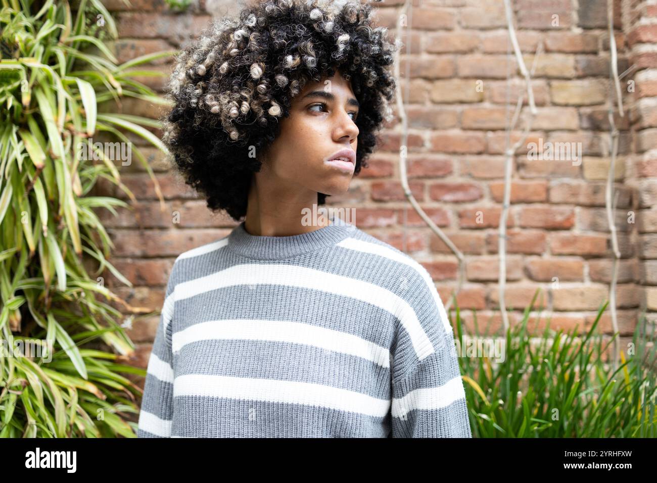 A mixed race woman with vitiligo enjoying a peaceful day at a ...