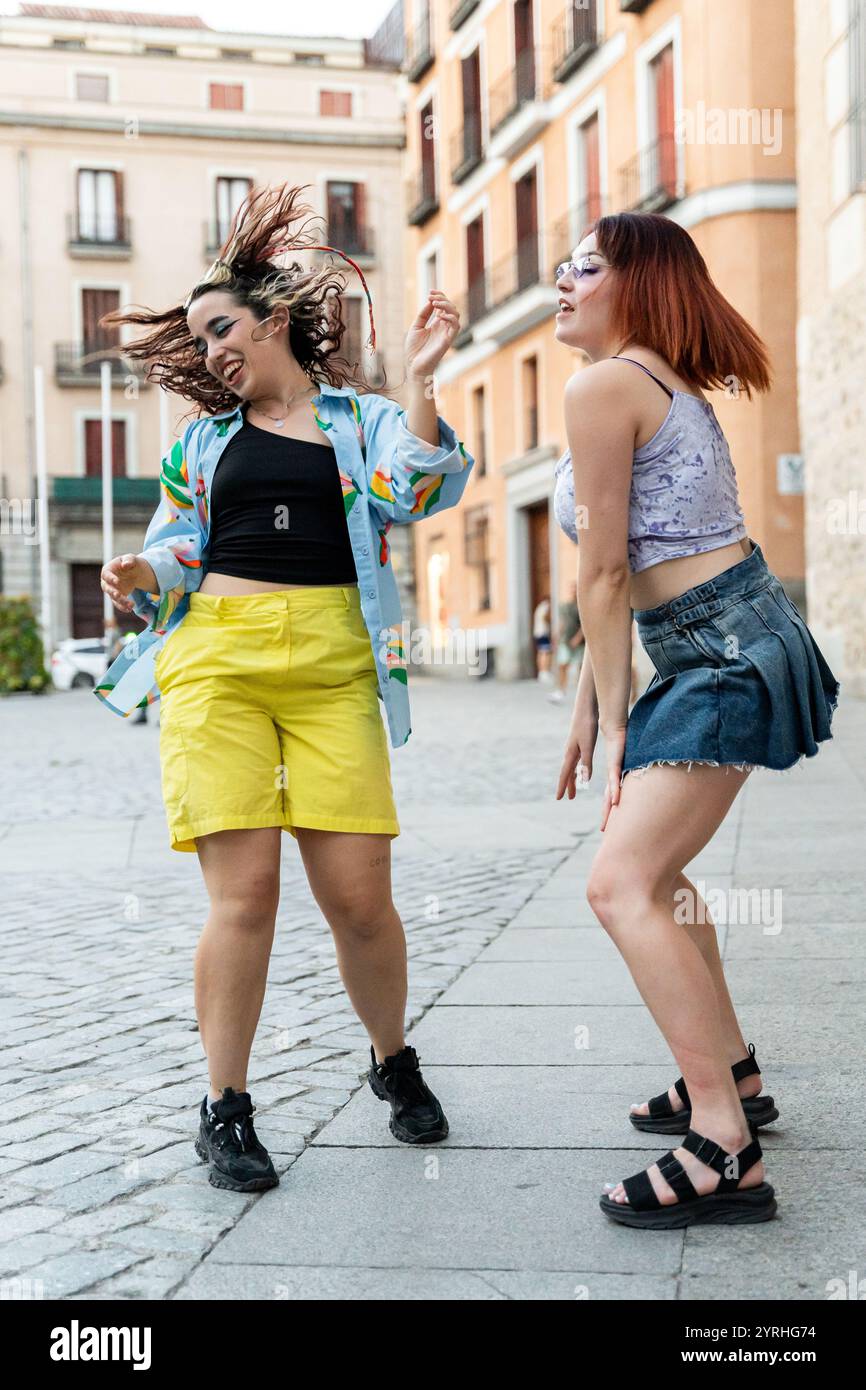Two women dance joyfully on hi-res stock photography and images - Alamy