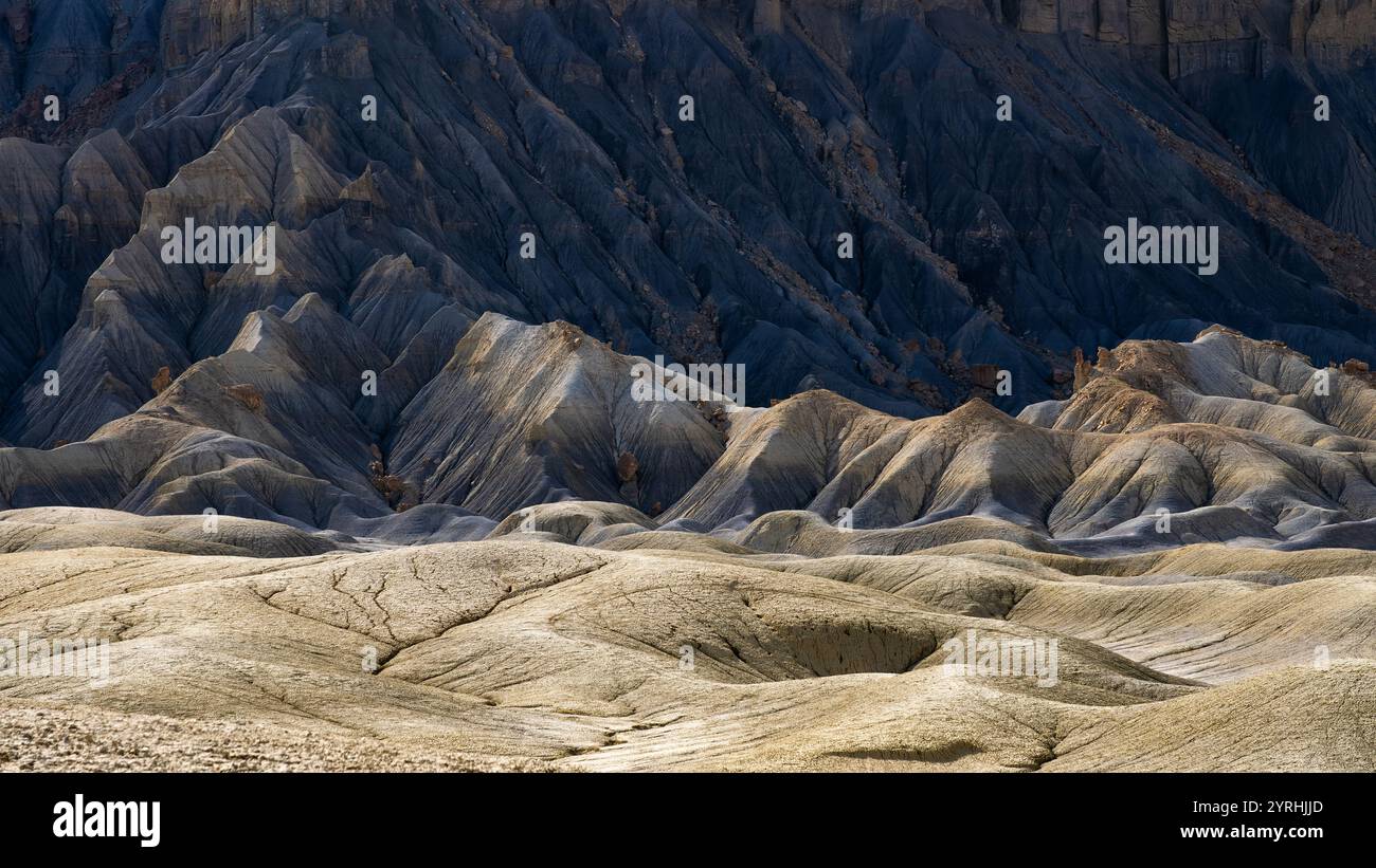 Factory Butte's rugged, sculpted terrain forms an awe-inspiring ...