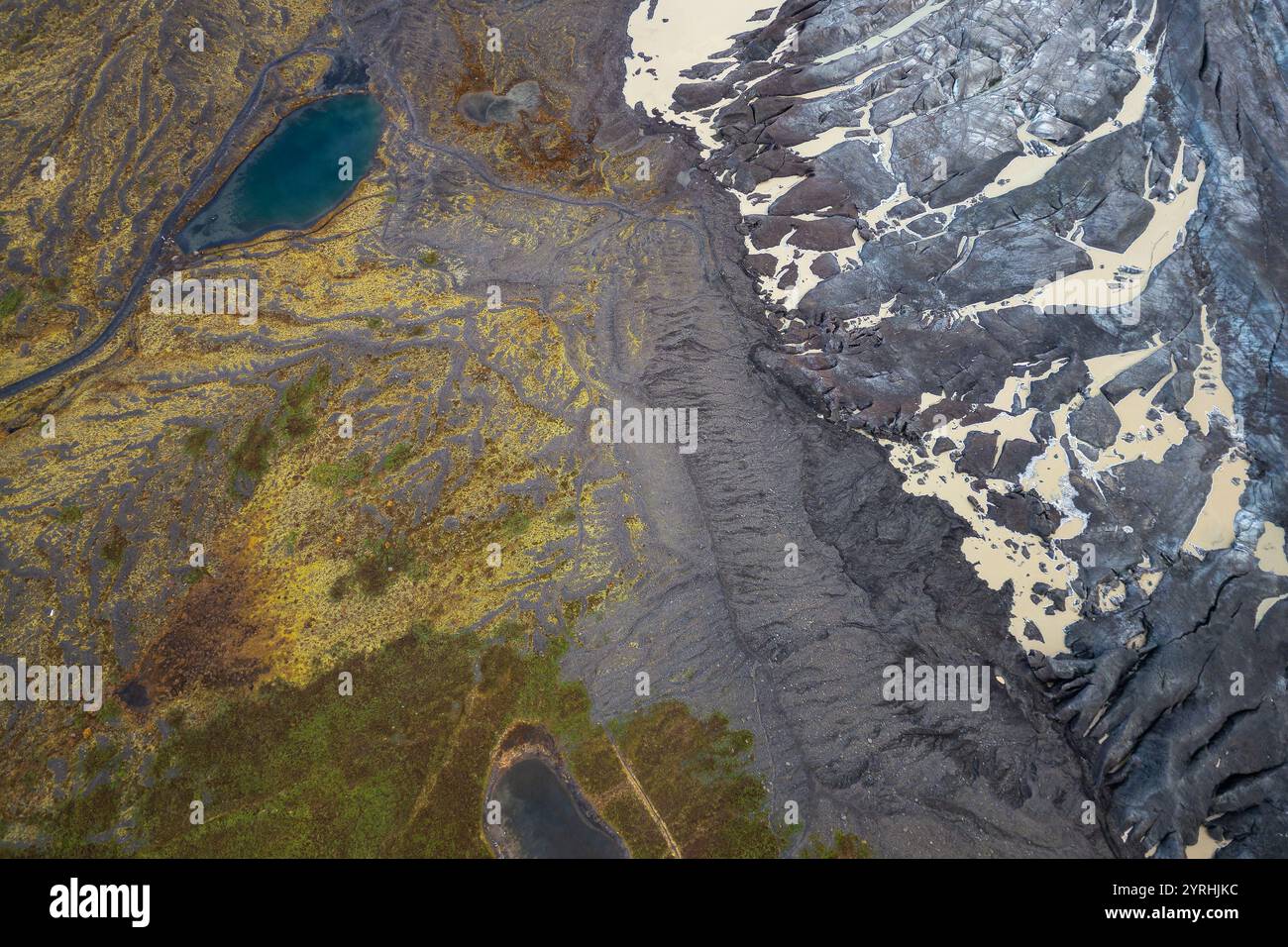 Aerial view of a landscape where glacial ice meets rugged earth The ...