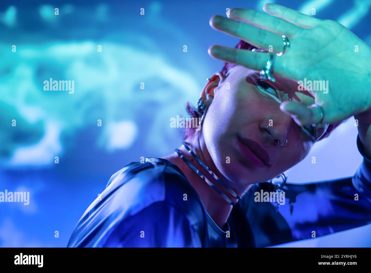 A vivid portrayal of a woman in futuristic attire engaged in a ...