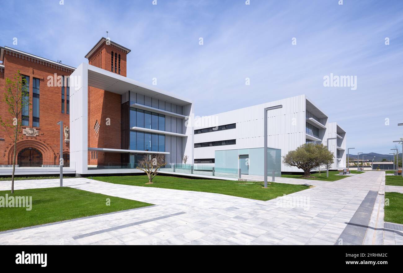 A modern hospital complex featuring both historic brick architecture ...