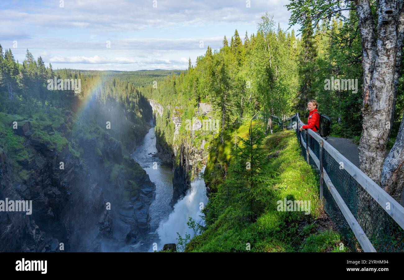 A woman enjoys the breathtaking wilderness of Swedish Lapland ...