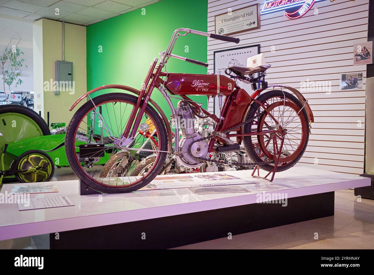 A vintage 1910 burgundy Wagner motorcycle on display at the Motorcycle ...