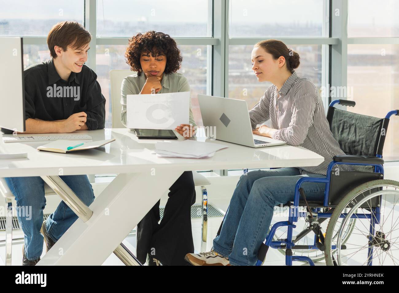 Teamwork brainstorm. Diverse multiracial colleagues woman in chair for ...