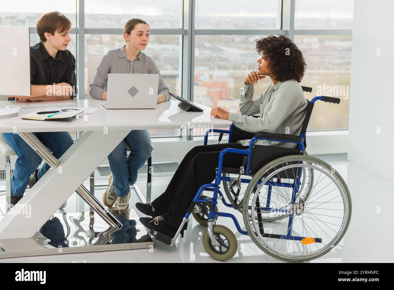 Teamwork brainstorm. Diverse multiracial colleagues woman in chair for ...