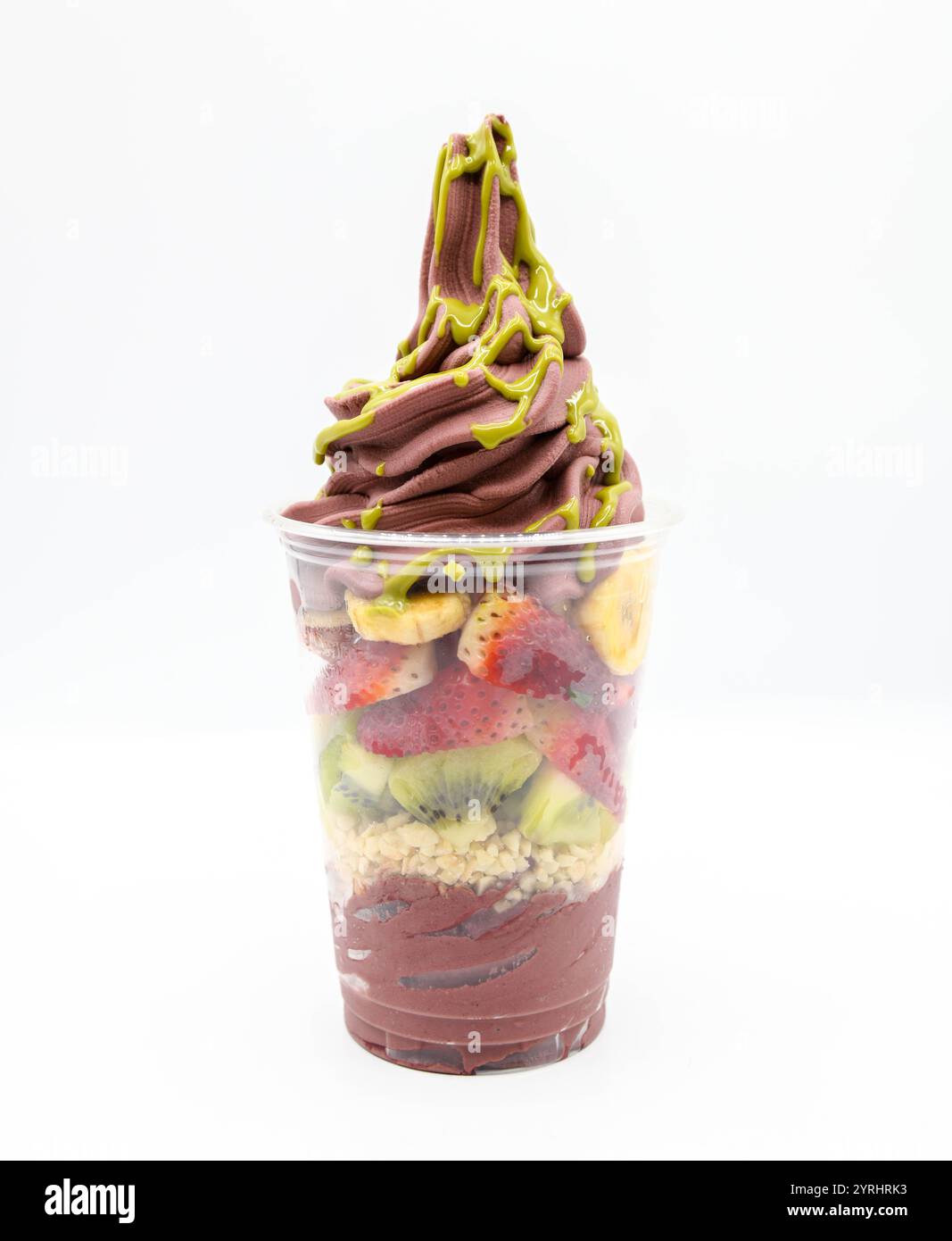 Yogurt and acai ice cream with chopped fruit pieces Stock Photo - Alamy