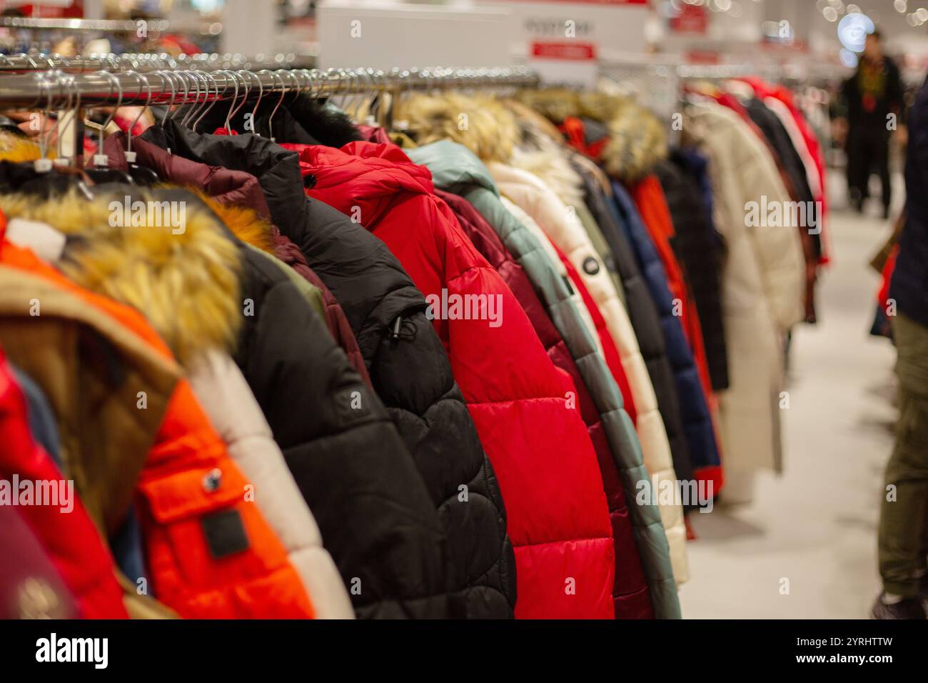 Lots of clothes and shoes in a clothing store Stock Photo - Alamy