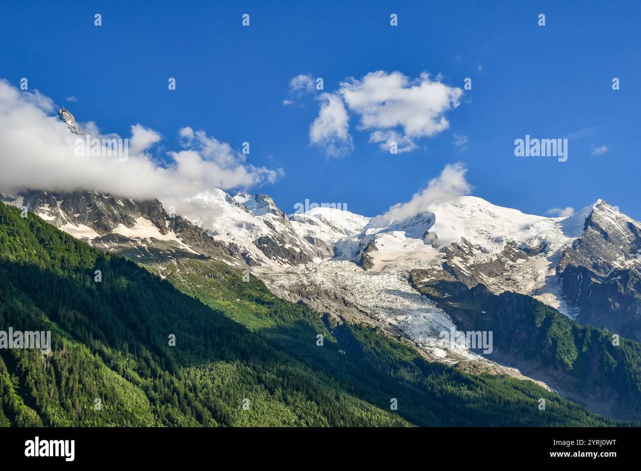 View of the summit of Mont Blanc (4805 m), with Dome and Aiguille du ...