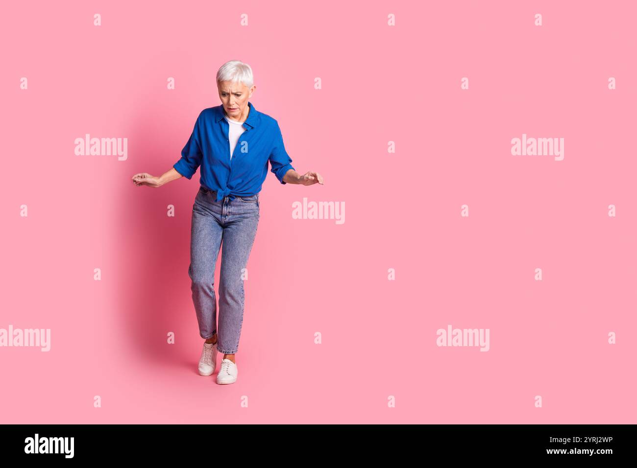 Full length photo of attractive scared lady dressed blue shirt walking ...