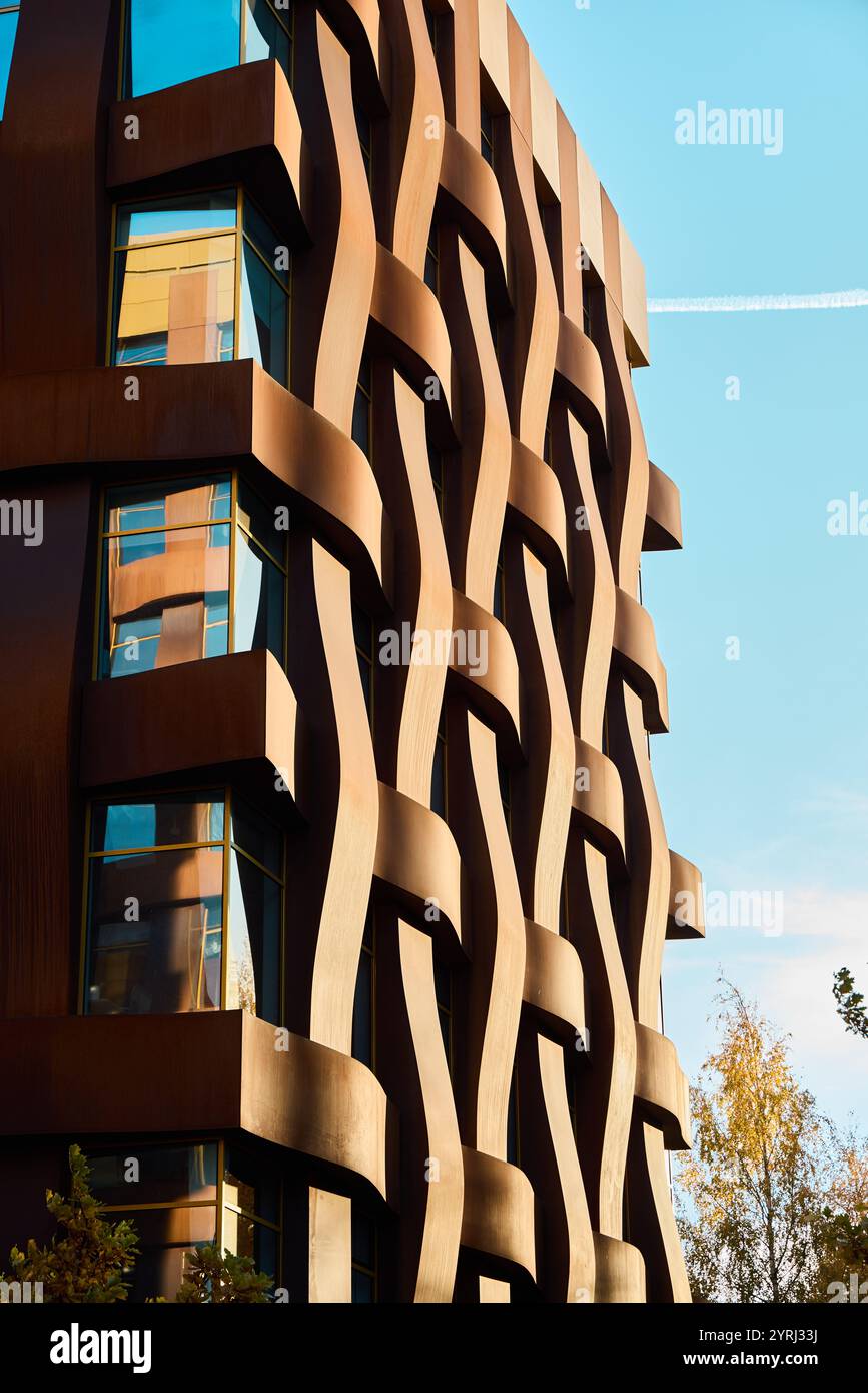 Contemporary Architectural Design Featuring a Unique Wavy Facade that ...