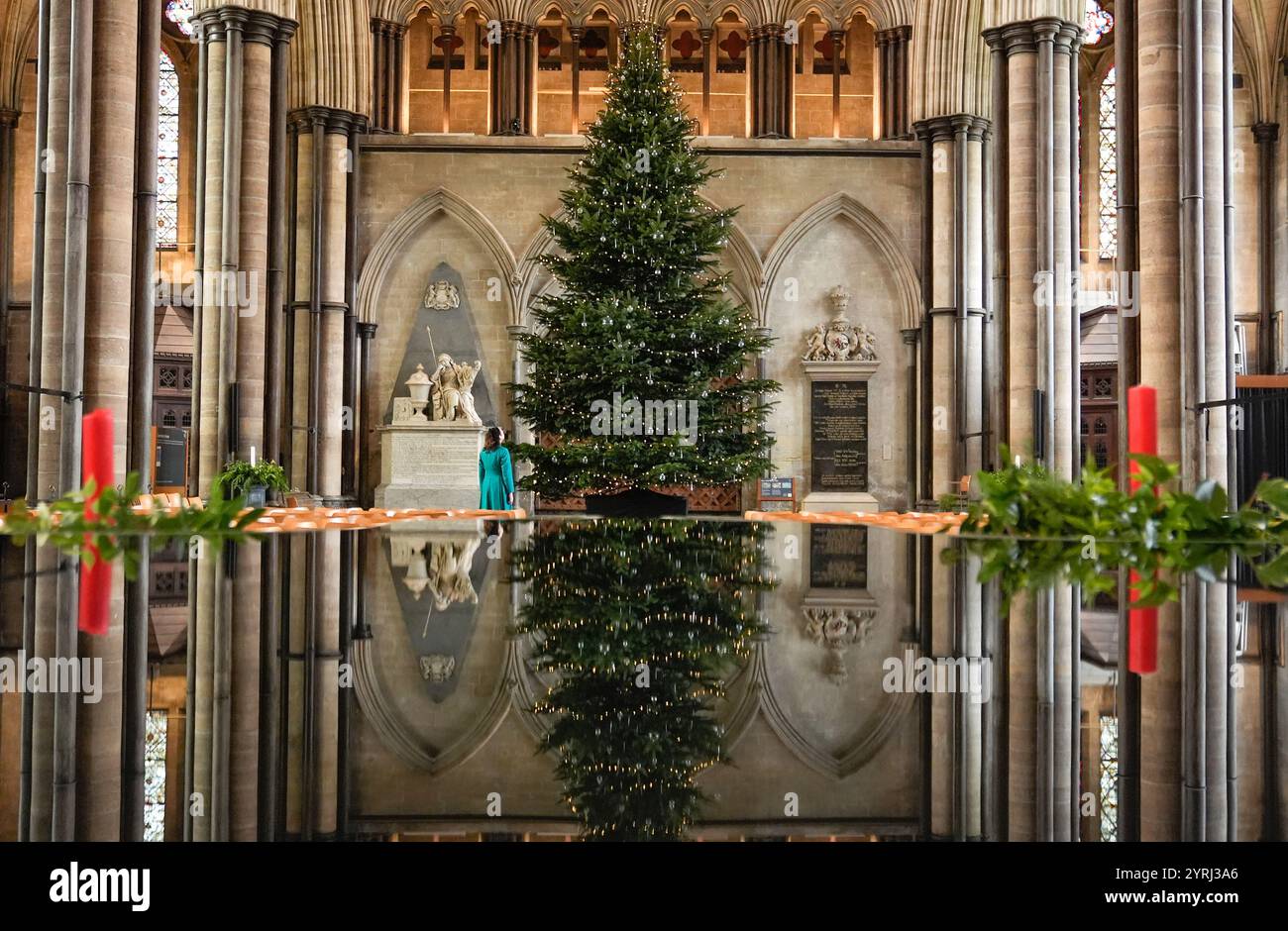 Head verger Esther Lycett looks up at Salisbury Cathedral's 28ft ...
