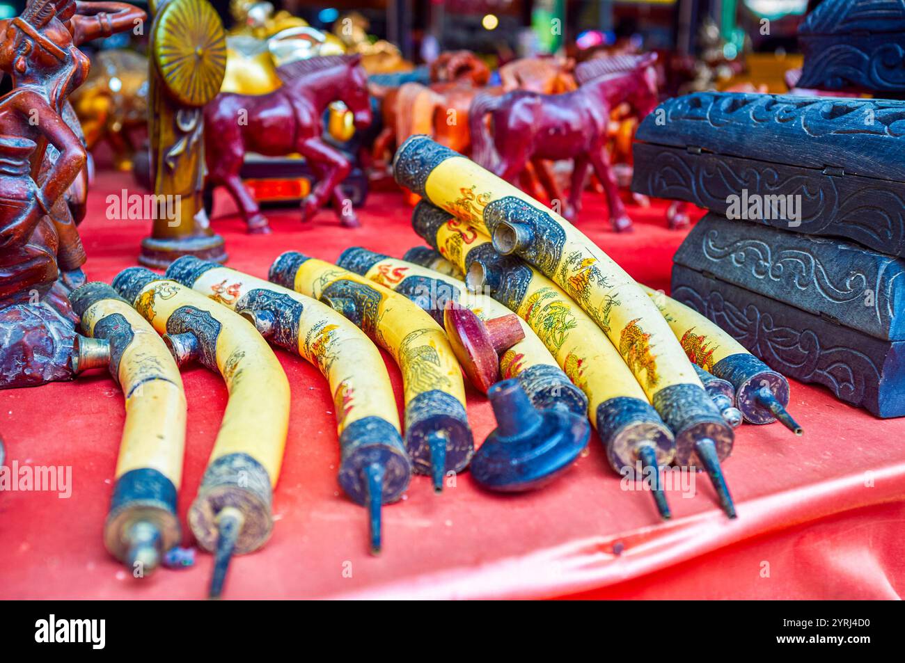 Traditional Asian smoking opium pipes wooden and engraves on the ...
