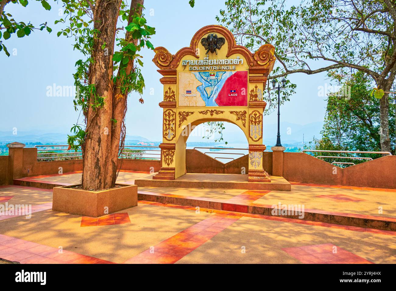 The signpoint with a map of Golden Triangle on the terrace with a ...