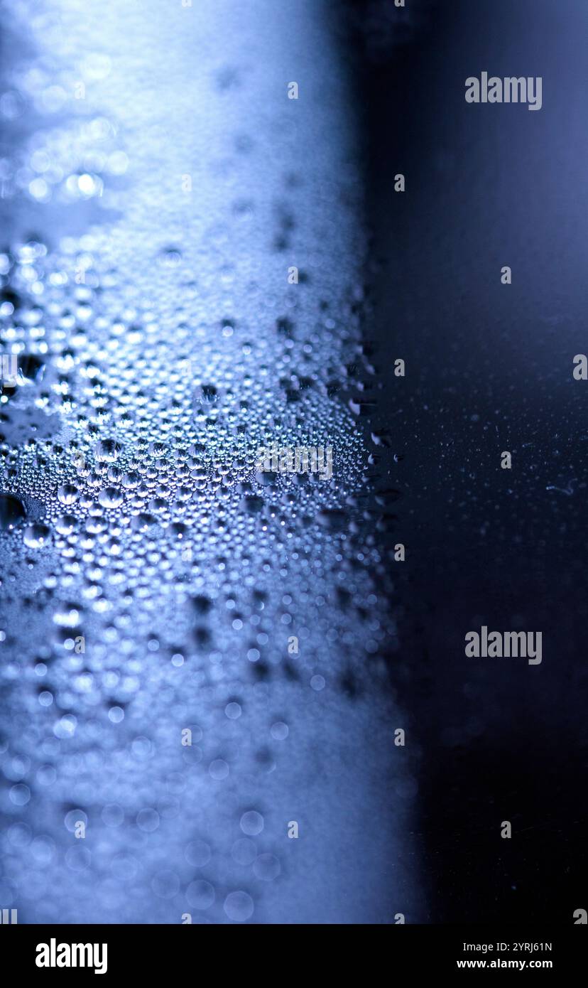 Blue Rain Bubbles Drops Running down a Window on a Wet Day Abstract Background Stock Photo - Alamy