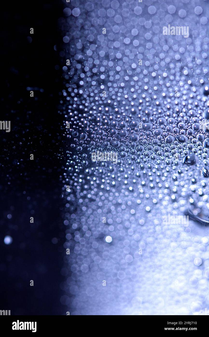 Blue Rain Bubbles Drops Running down a Window on a Wet Day Abstract Background Stock Photo - Alamy