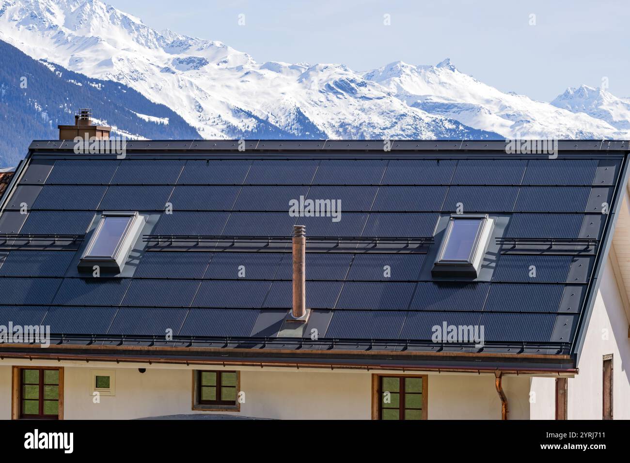 Residential house with solar roof in the Swiss Alps Stock Photo - Alamy