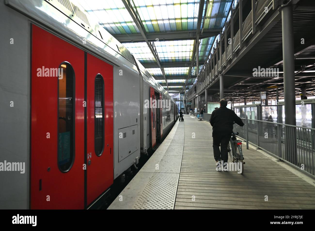 Train at Oostende station with man and his bicycle – Ostend, Belgium ...