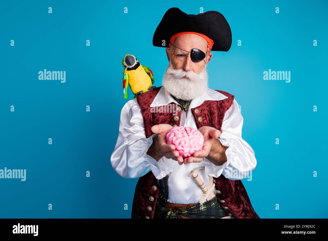 Photo portrait of old funny pirate male stressed hold brain dressed ...
