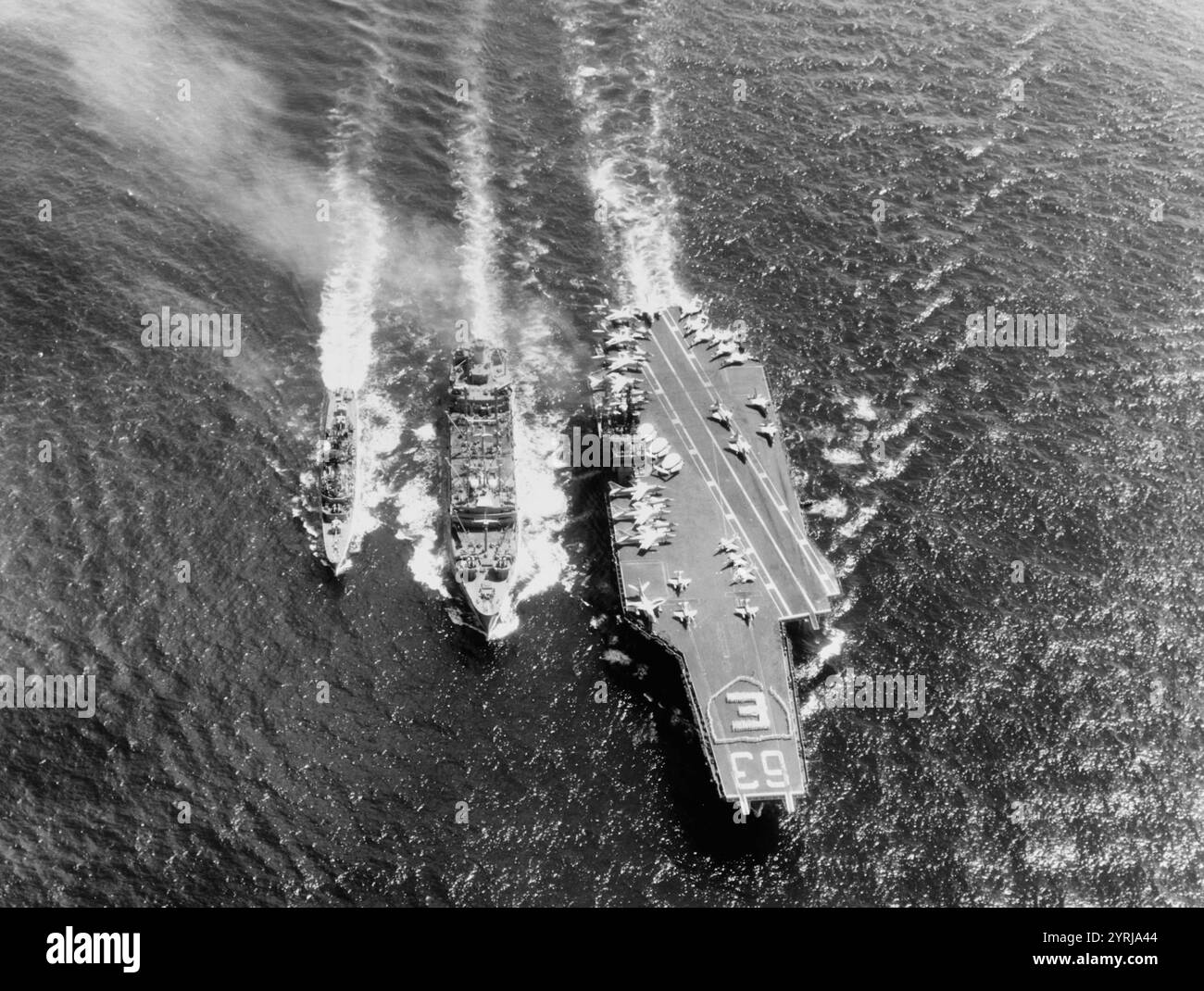 USS Kitty Hawk (CVA-63) and USS Turner Joy (DD-951) refueling from USS ...