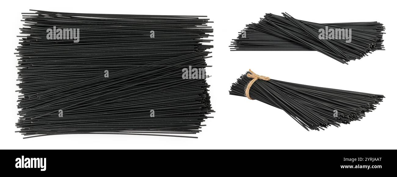 uncooked black spaghetti isolated on white background. Top view. Flat ...