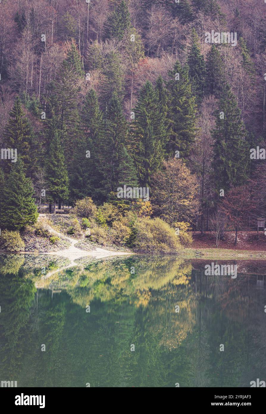 The view across the lake at Lago di Predil in Italy on the Slovanian ...