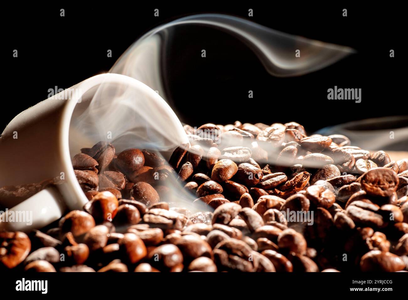 Horizontal photograph of a cup of coffee on a black background with ...