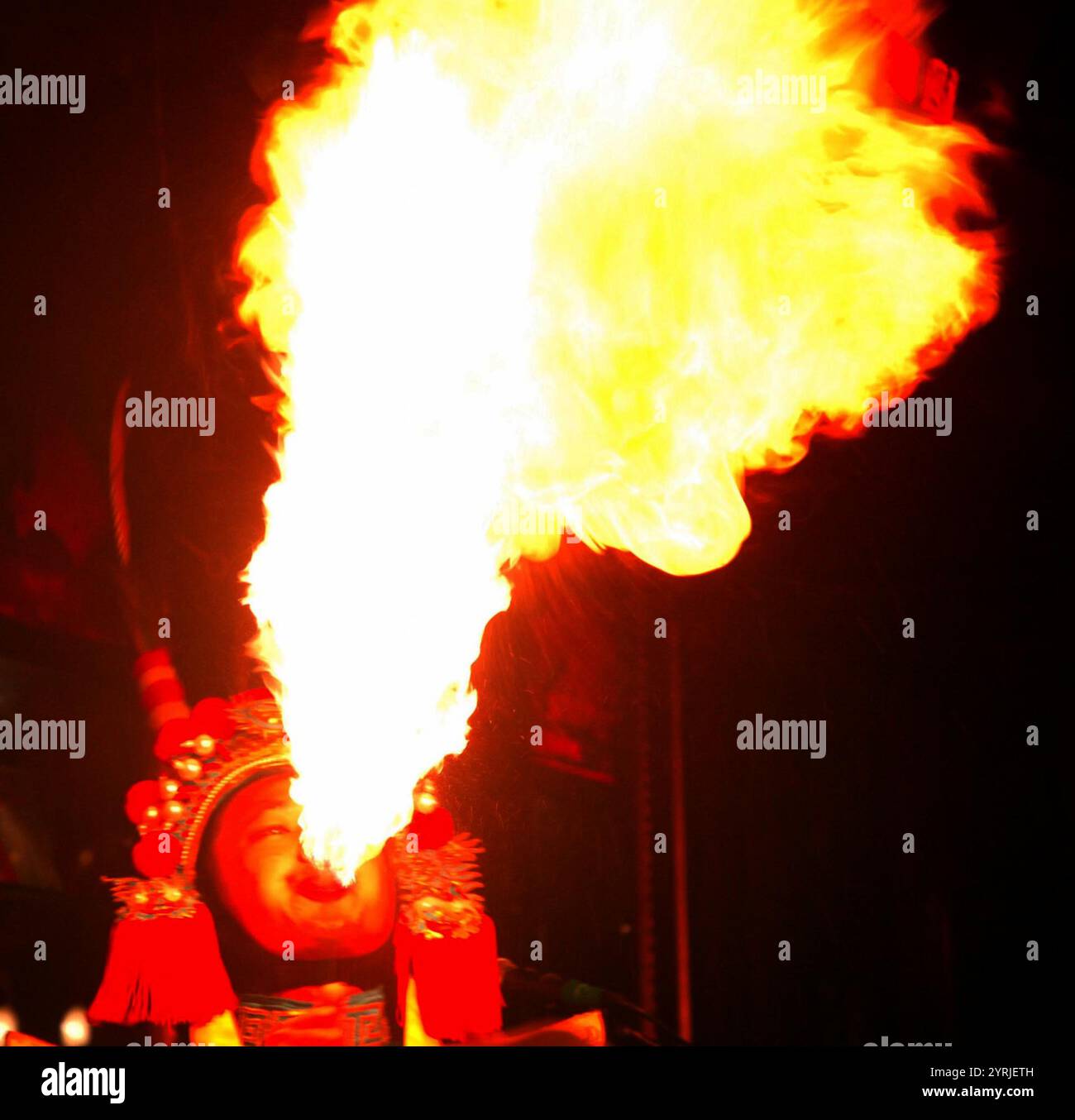 Chinese Fire Eater. Fire eating is the act of putting a flaming object ...