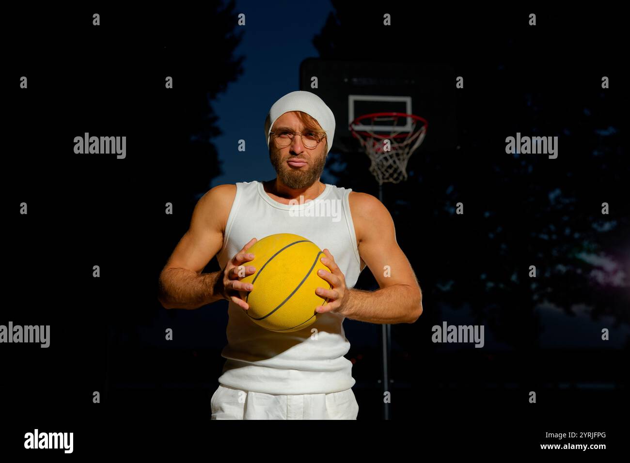 Man stands on basketball court hi-res stock photography and images - Alamy