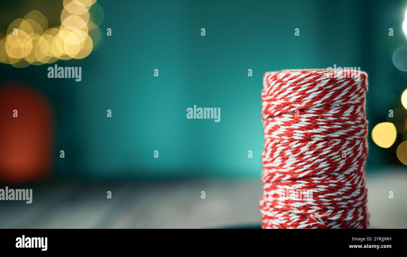 Christmas thread spool rotates continuously Stock Photo - Alamy